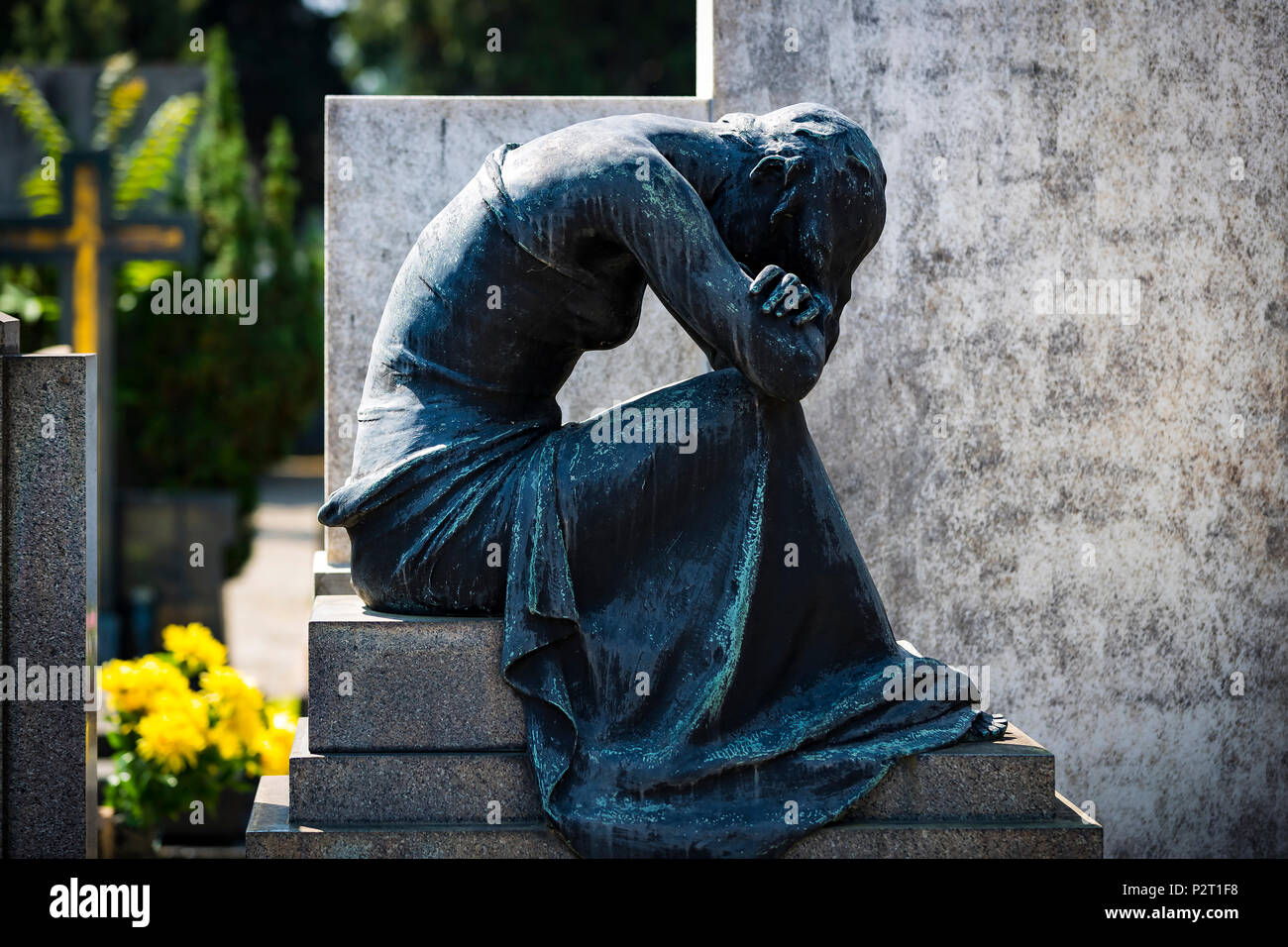 5 JUNE 2018, MILAN, ITALY: Statues of mourning at the graves of the ...