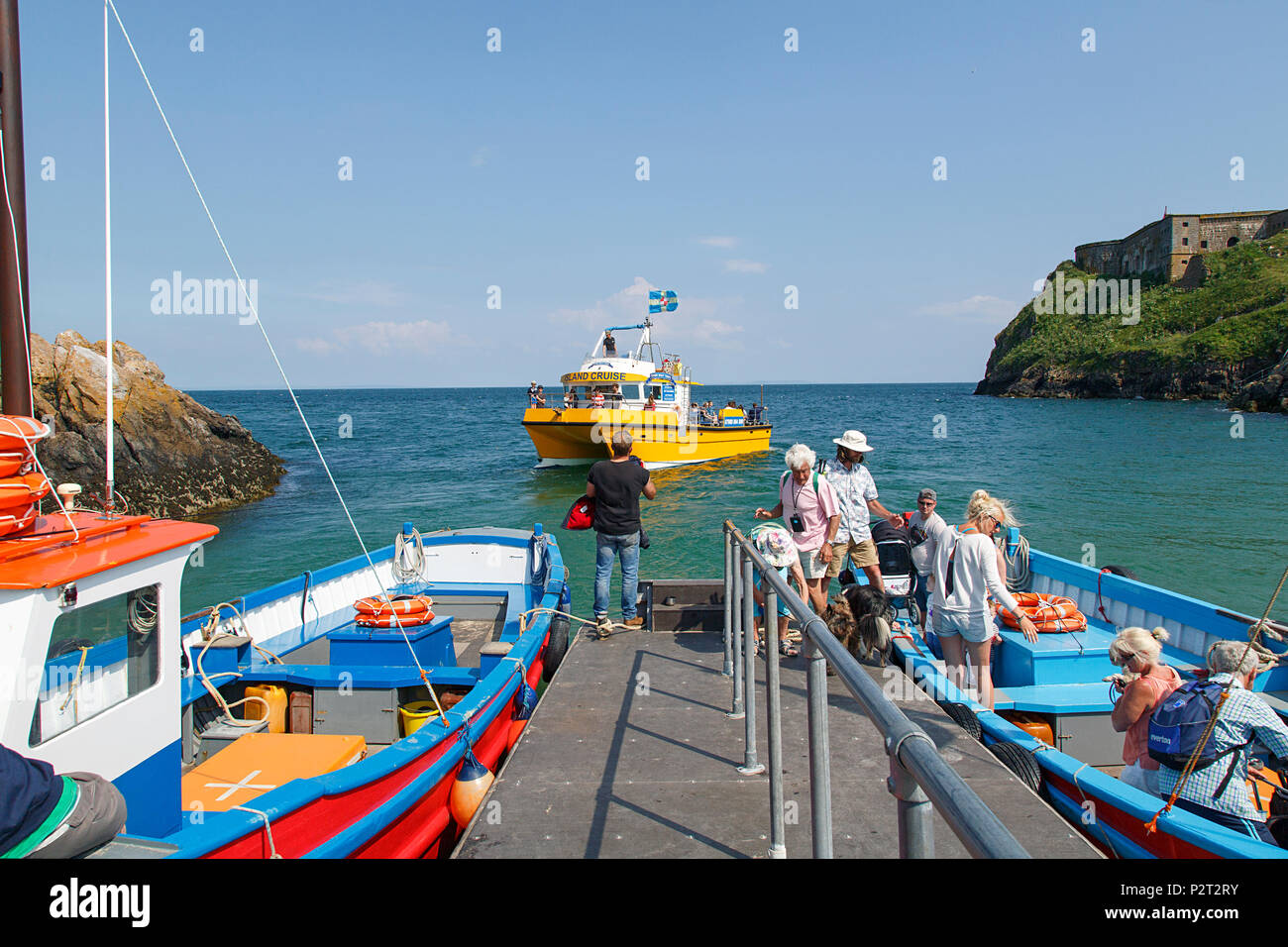 Tenby, UK: June 11, 2018: Tour boats moored at the pontoon in Tenby ...