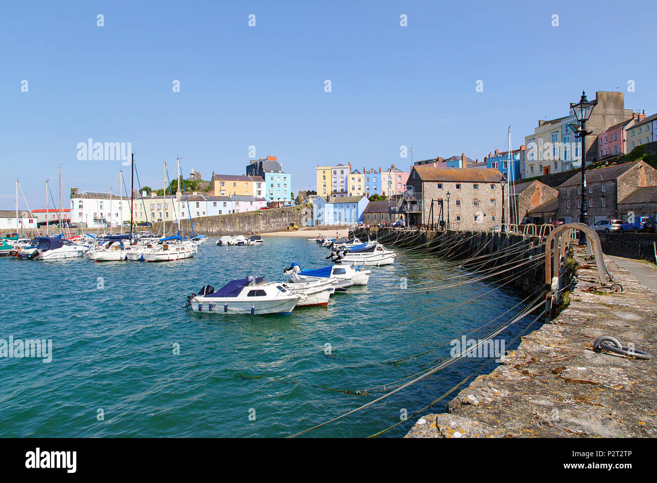 Tenby, UK: June 11, 2018: Boats moored in Tenby Harbour at high tide ...