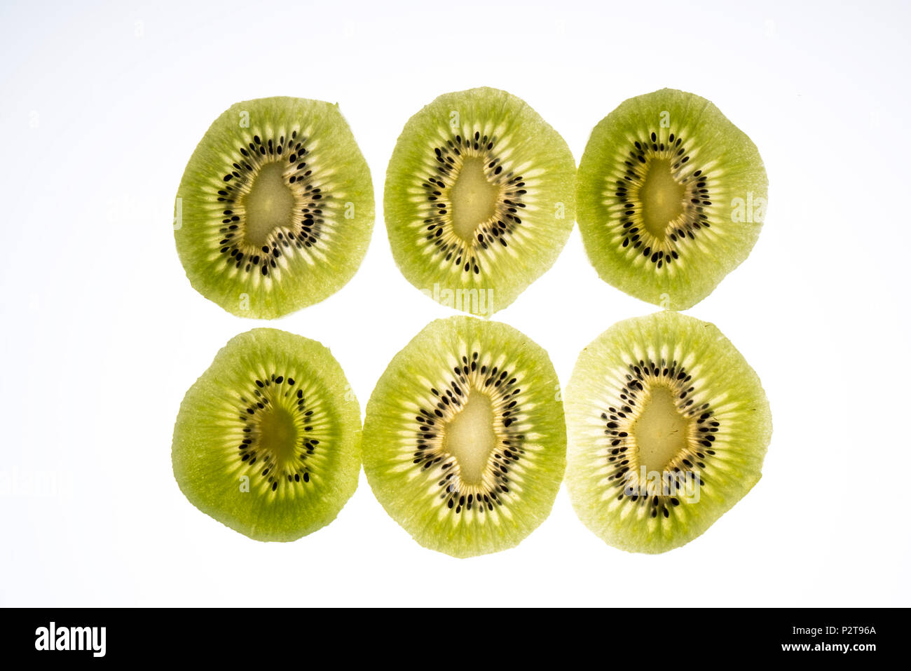 kiwi slices lit from the back Stock Photo - Alamy
