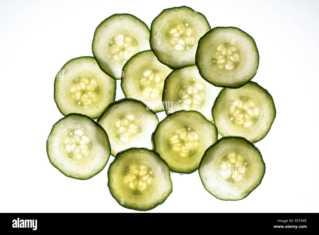 courgette slices lit from the back Stock Photo - Alamy