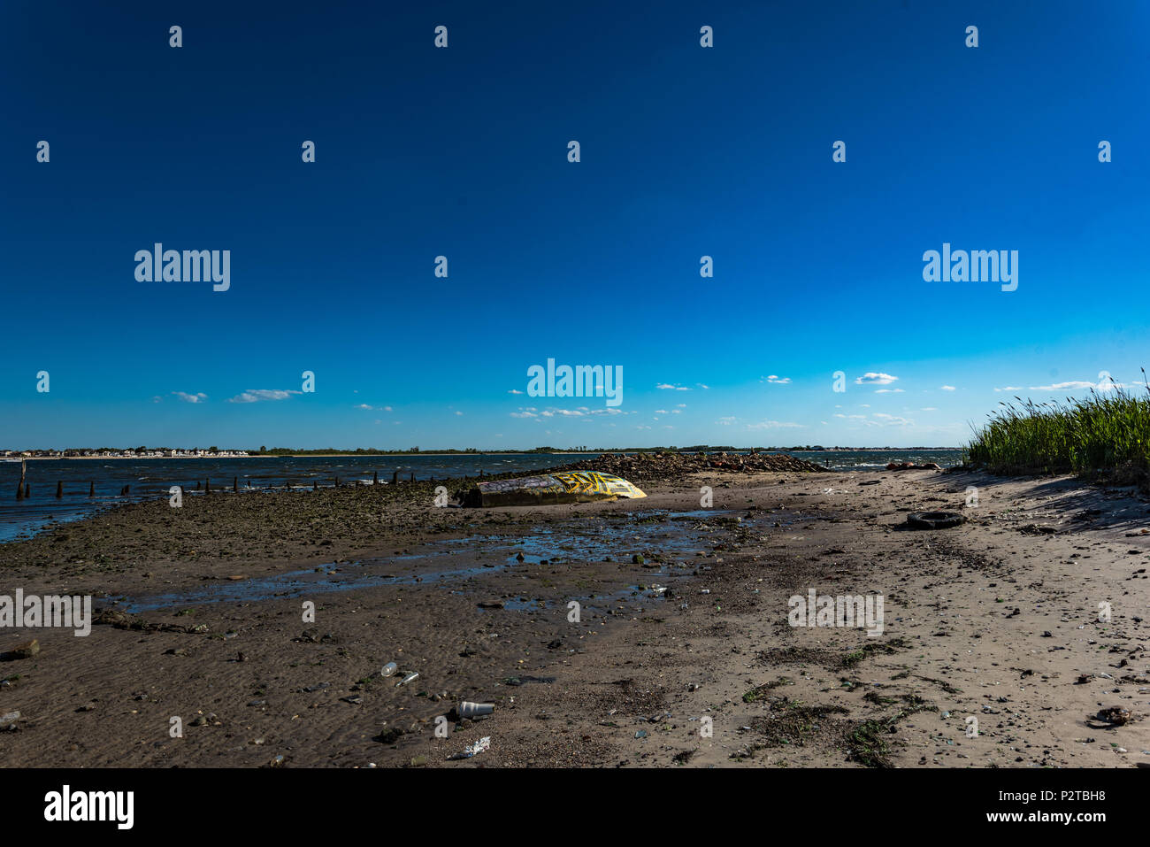 The Barren Island shore on the side of the Dead Horse Bay, also known ...