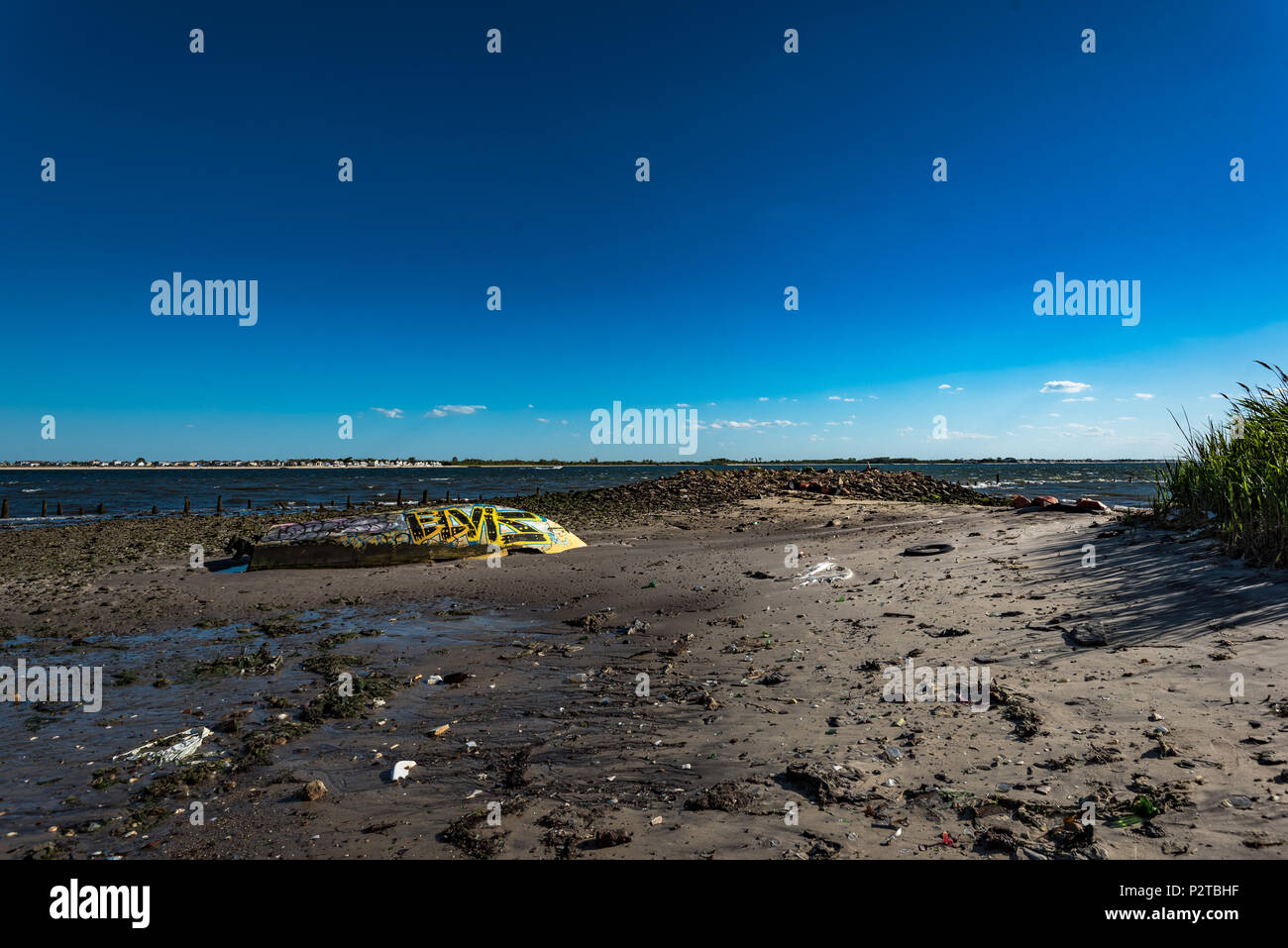 The Barren Island shore on the side of the Dead Horse Bay, also known ...