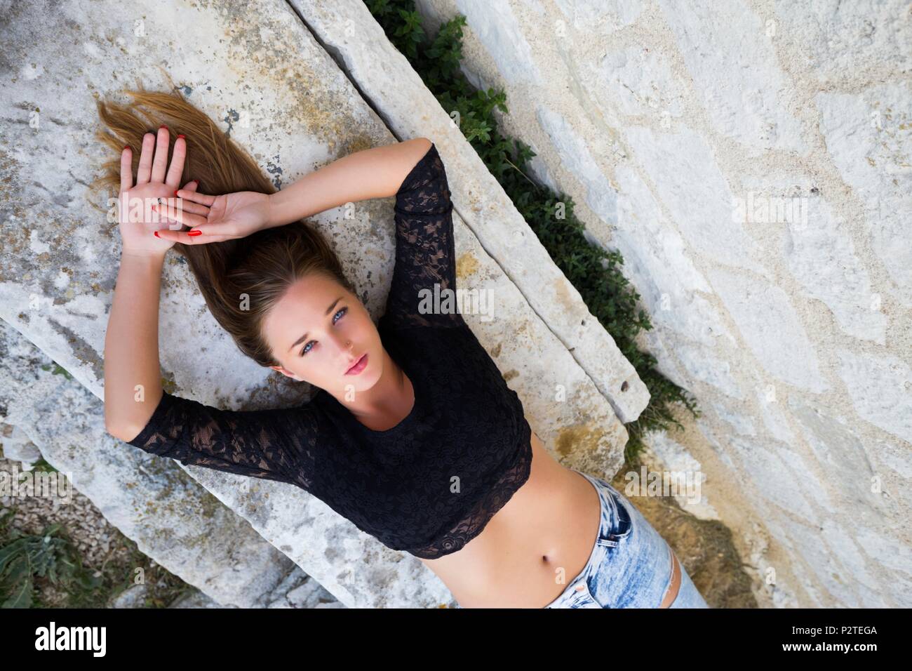 Lying laying down position posture hi-res stock photography and images ...