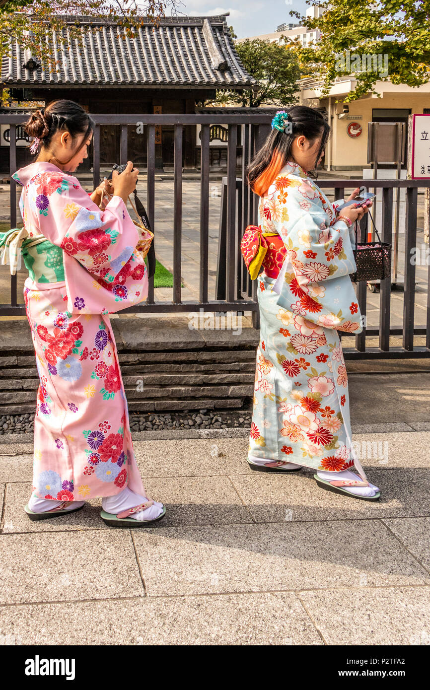 Japanese walking round in traditional kimono walking around area of ...