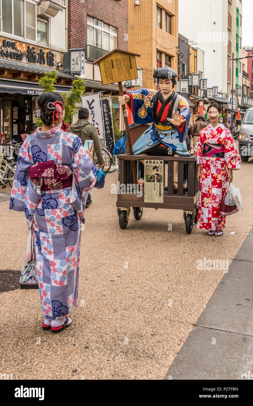 Japanese walking round in traditional kimono walking around area of ...