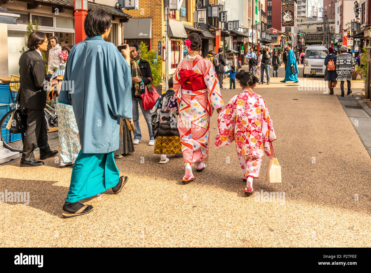Japanese walking round in traditional kimono walking around area of ...