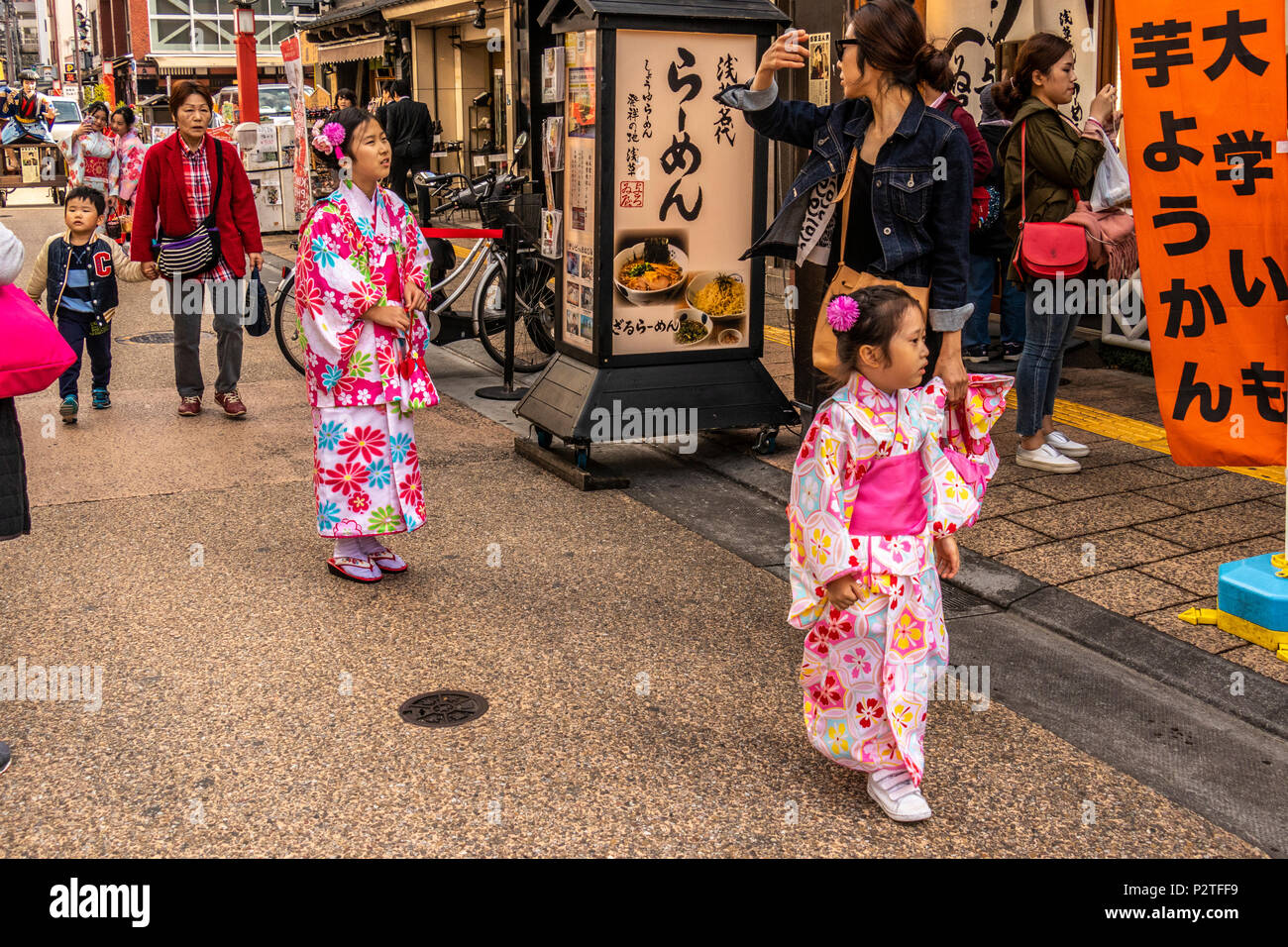 Japanese walking round in traditional kimono walking around area of ...