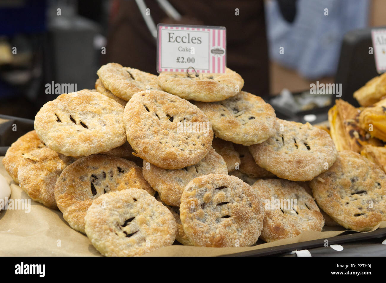 Eccles cakes for sale on a market stall Stock Photo - Alamy