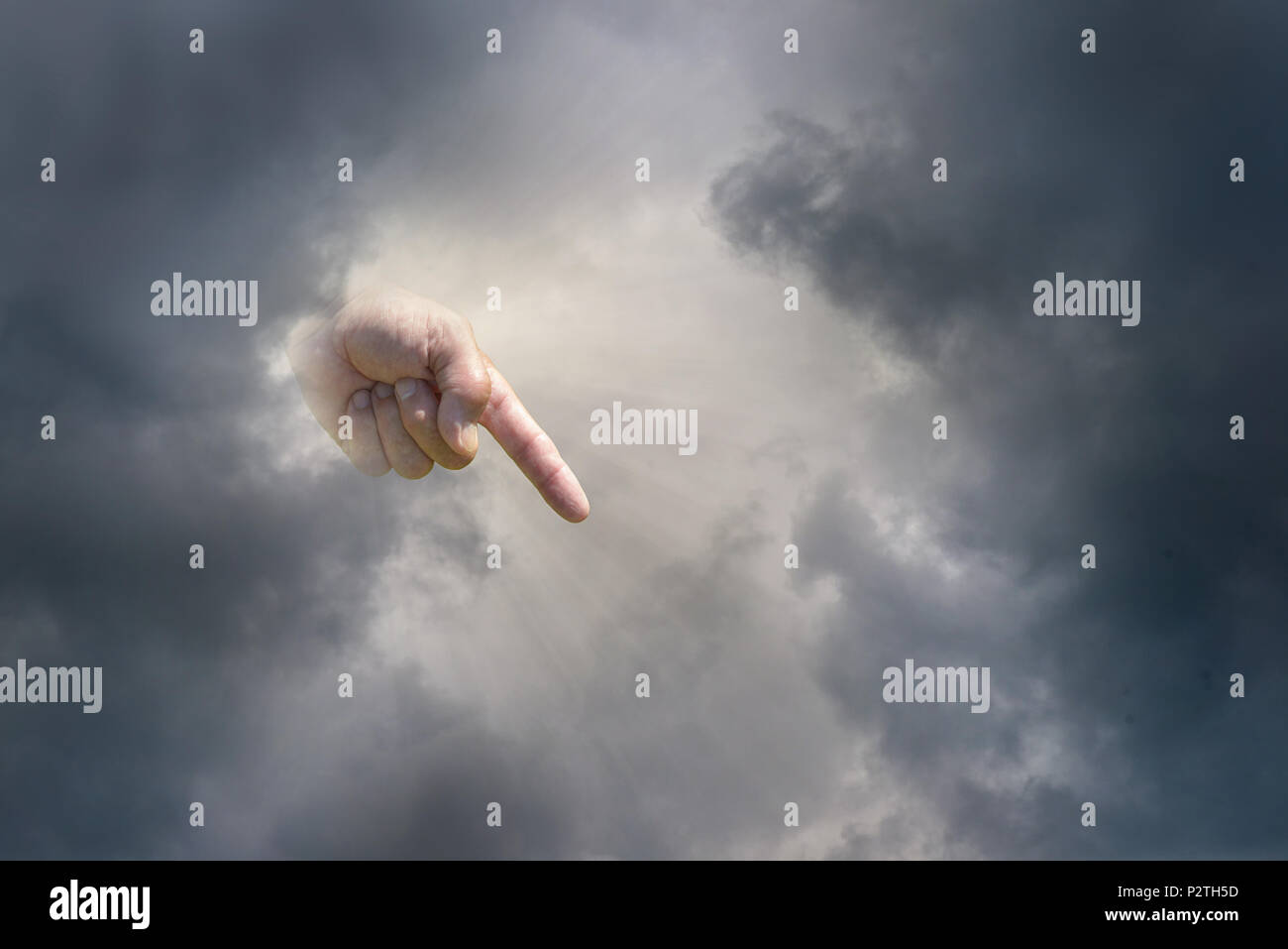 Pointing the finger of God Stock Photo - Alamy