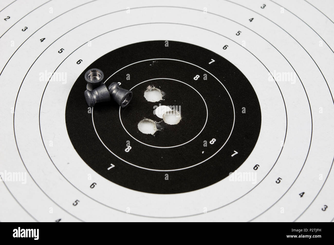 Shooting and pneumatic weapon. Shield and hits with lead bullets on a ...