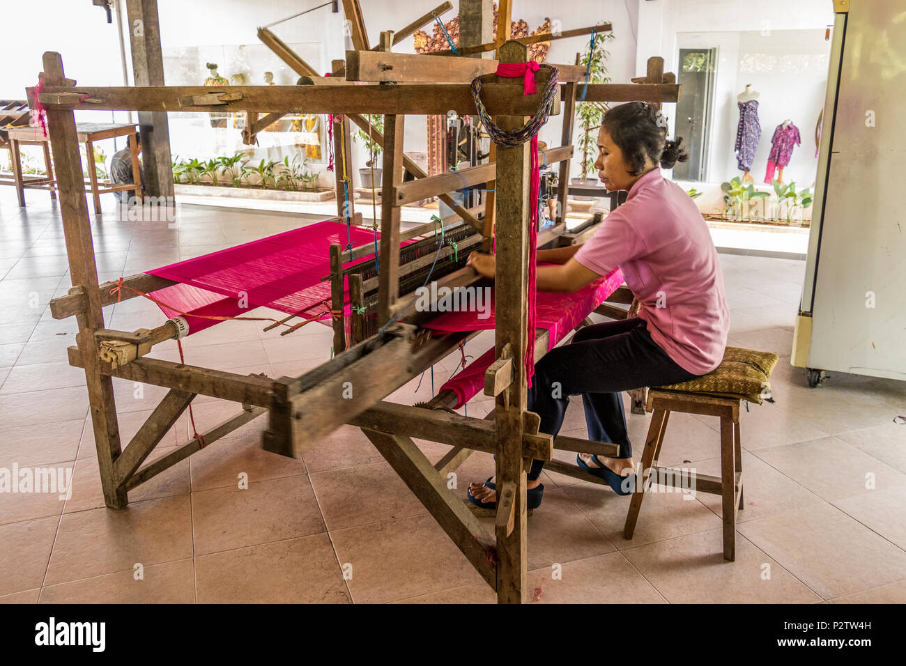 Weaver on loom hi-res stock photography and images - Alamy