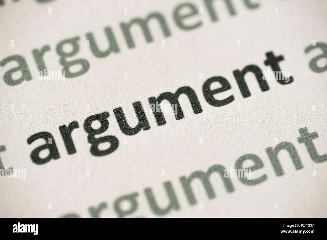 word argument printed on white paper macro Stock Photo - Alamy