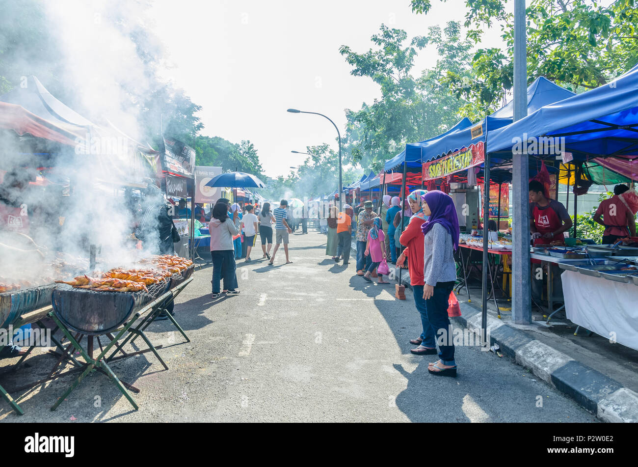 Kuala Lumpur,Malaysia - July 5, 2015: People seen walking and buying ...