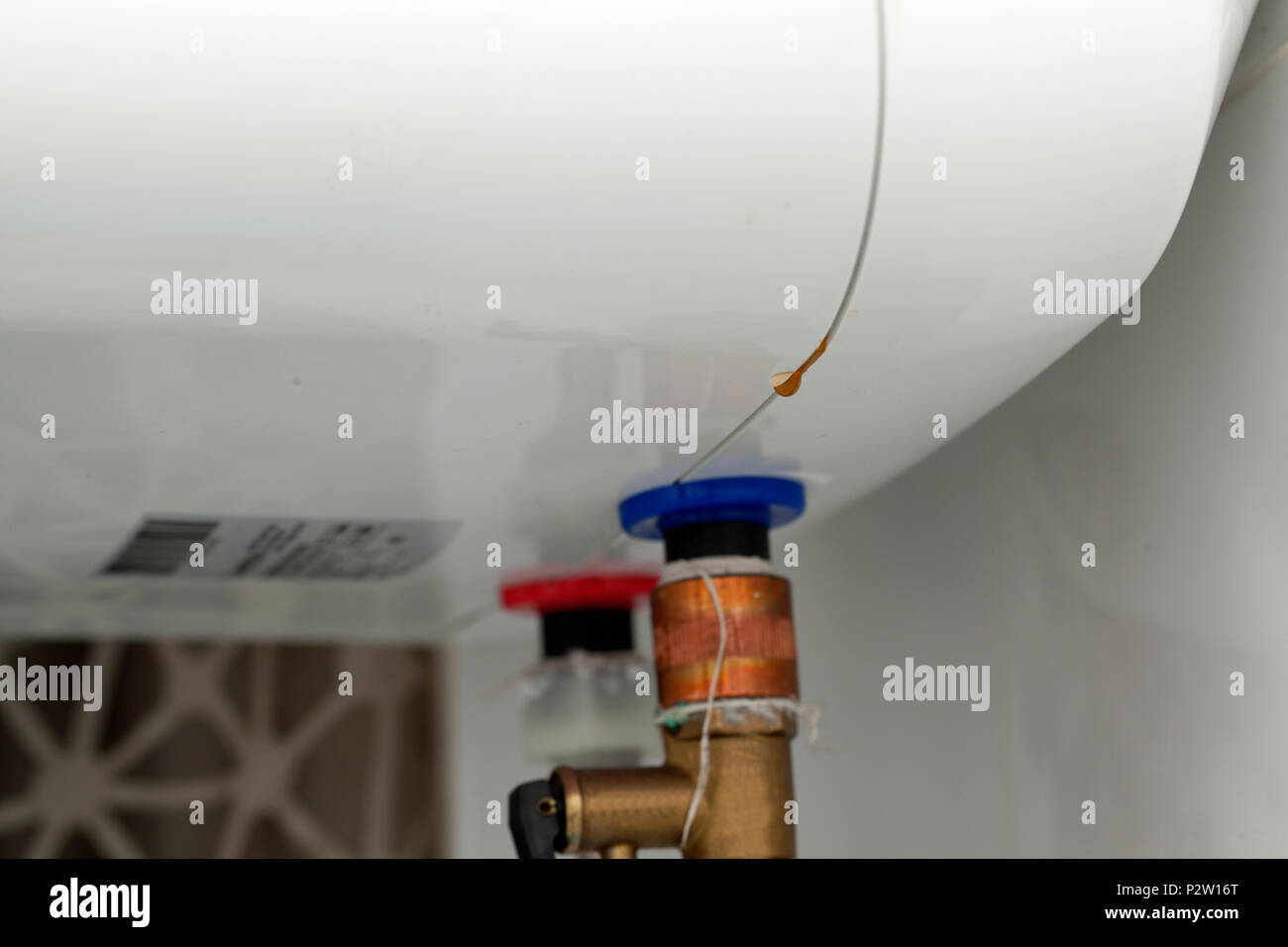 leaking boiler with a rusty drop of water visible in the seam Stock ...