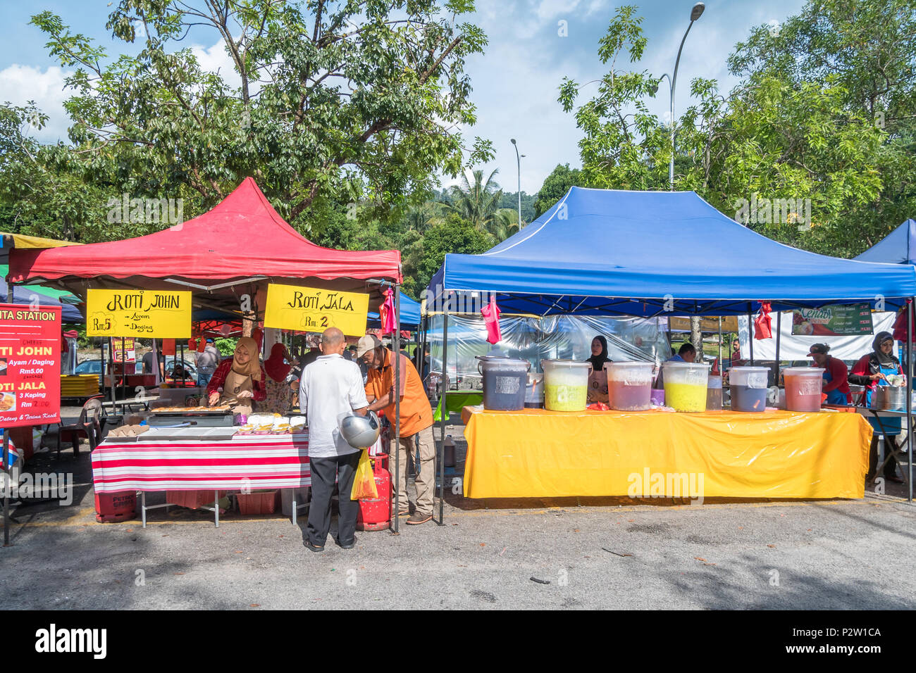 Kuala Lumpur,Malaysia - May 27, 2018 : A man can seen buying food at ...