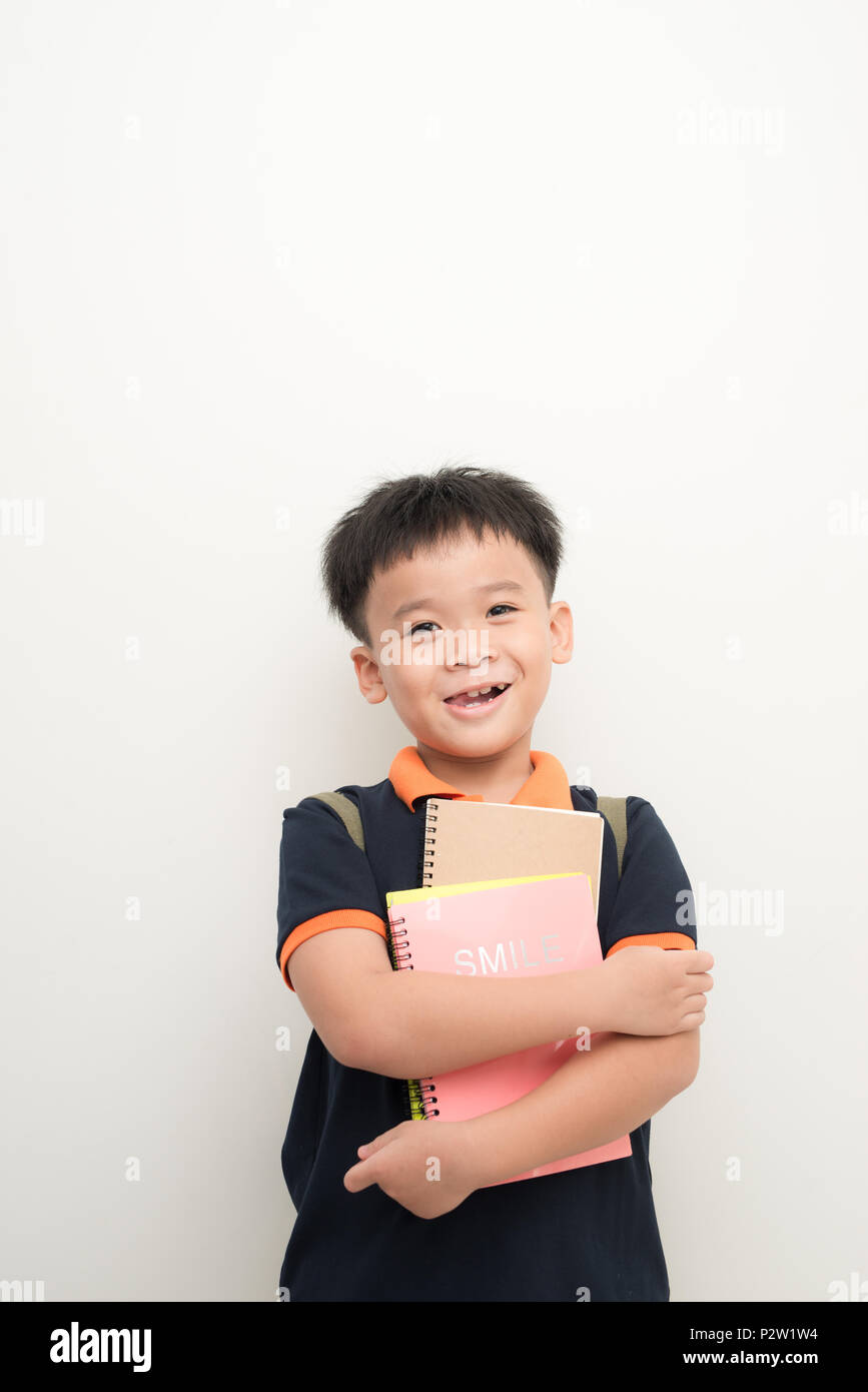 Kids holding books hi-res stock photography and images - Alamy