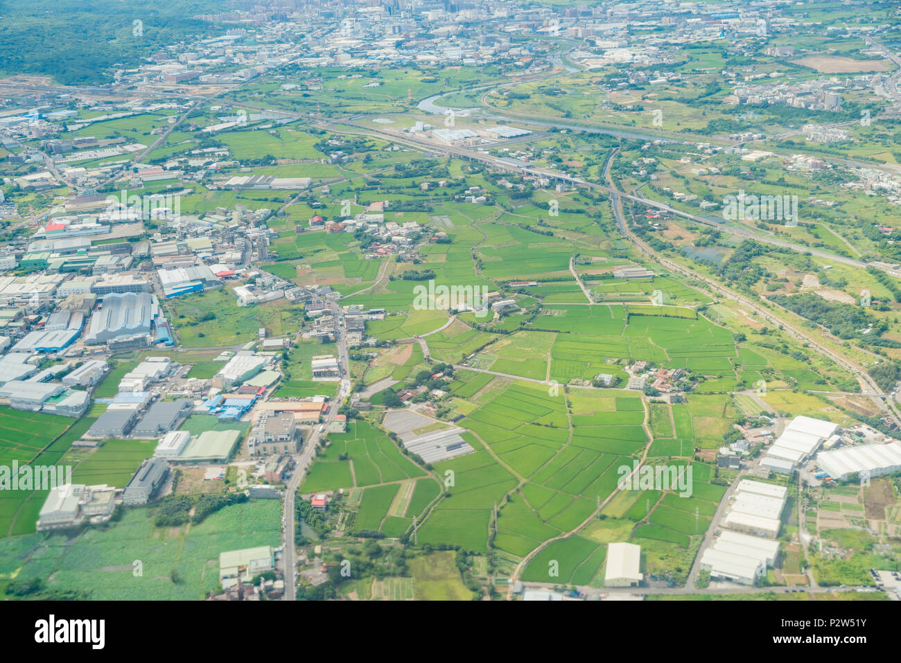 Aerial view of the beautiful Taipei City, from an airplane window seat ...