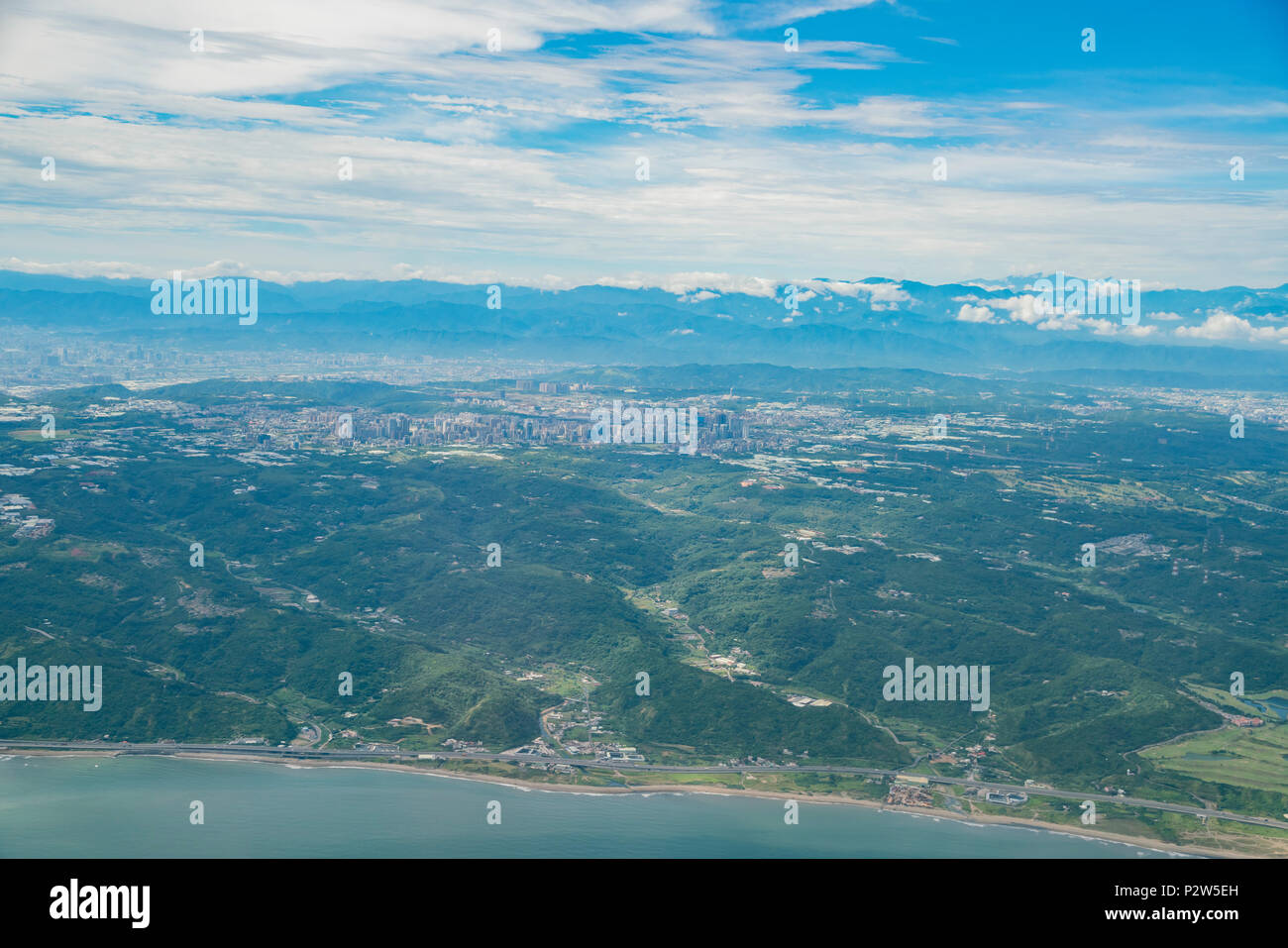 Aerial view of the beautiful Taipei City, from an airplane window seat ...