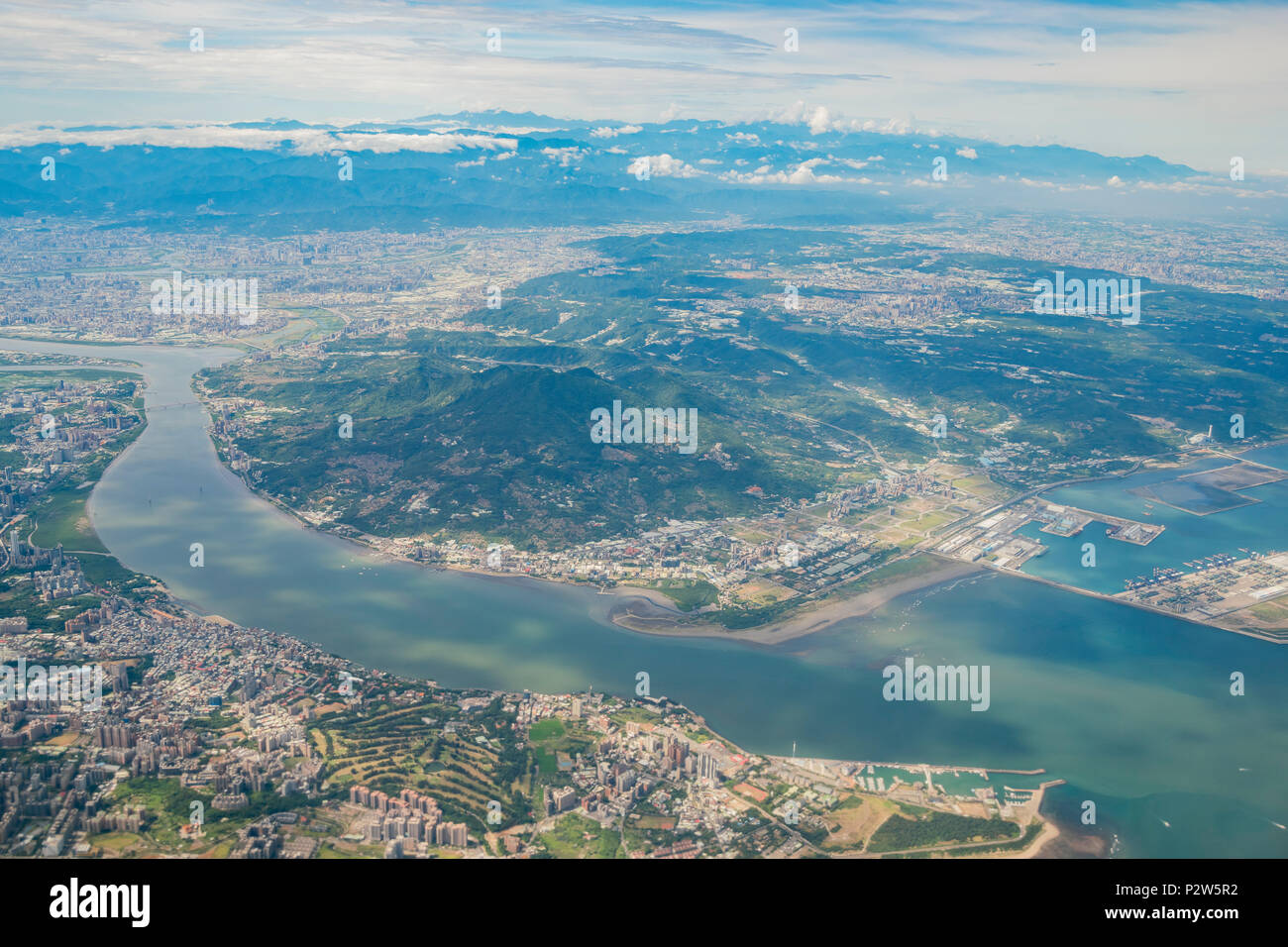 Aerial view of the beautiful Taipei City, from an airplane window seat ...
