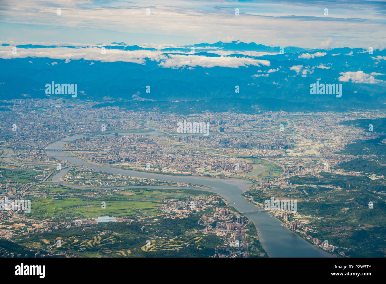 Aerial view of the beautiful Taipei City, from an airplane window seat ...