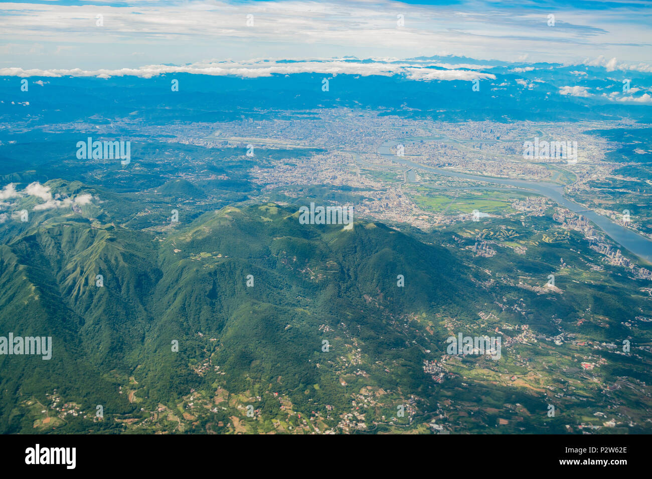 Aerial view of the beautiful Taipei City, from an airplane window seat ...