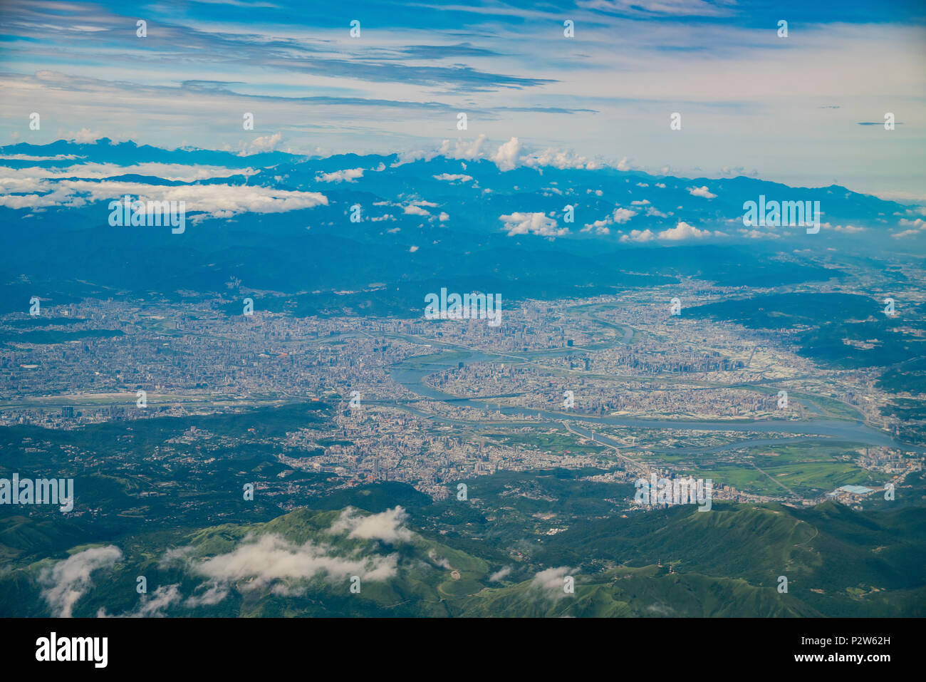 Aerial view of the beautiful Taipei City, from an airplane window seat ...