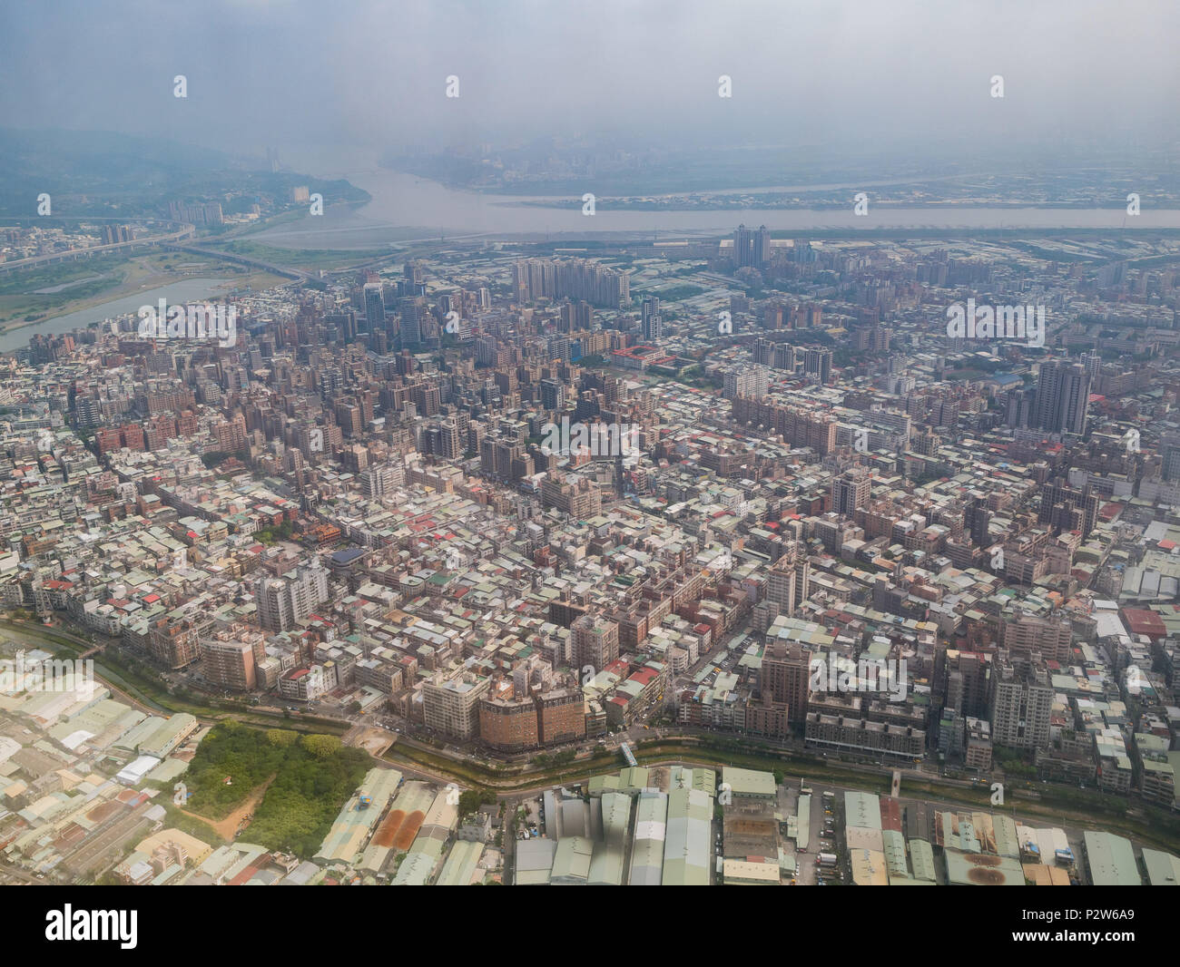 Aerial view of the beautiful Taipei City, from an airplane window seat ...