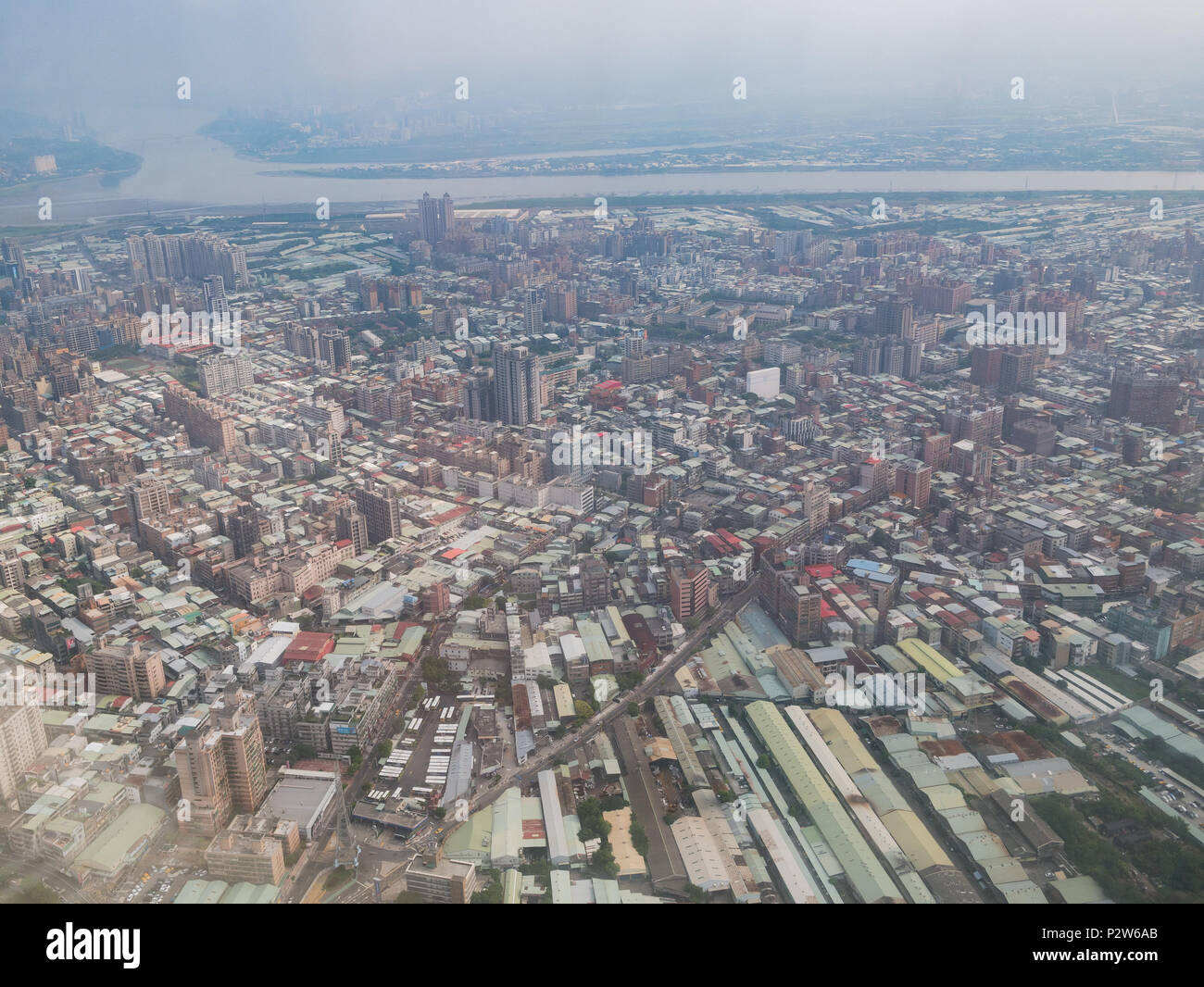 Aerial view of the beautiful Taipei City, from an airplane window seat ...