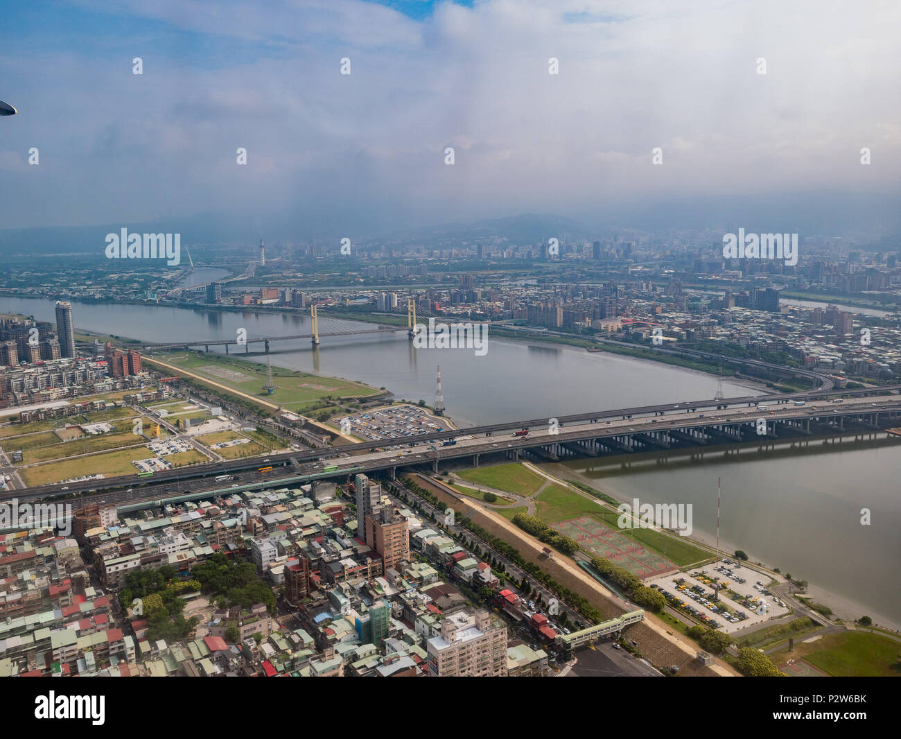 Aerial view of the beautiful Taipei City, from an airplane window seat ...