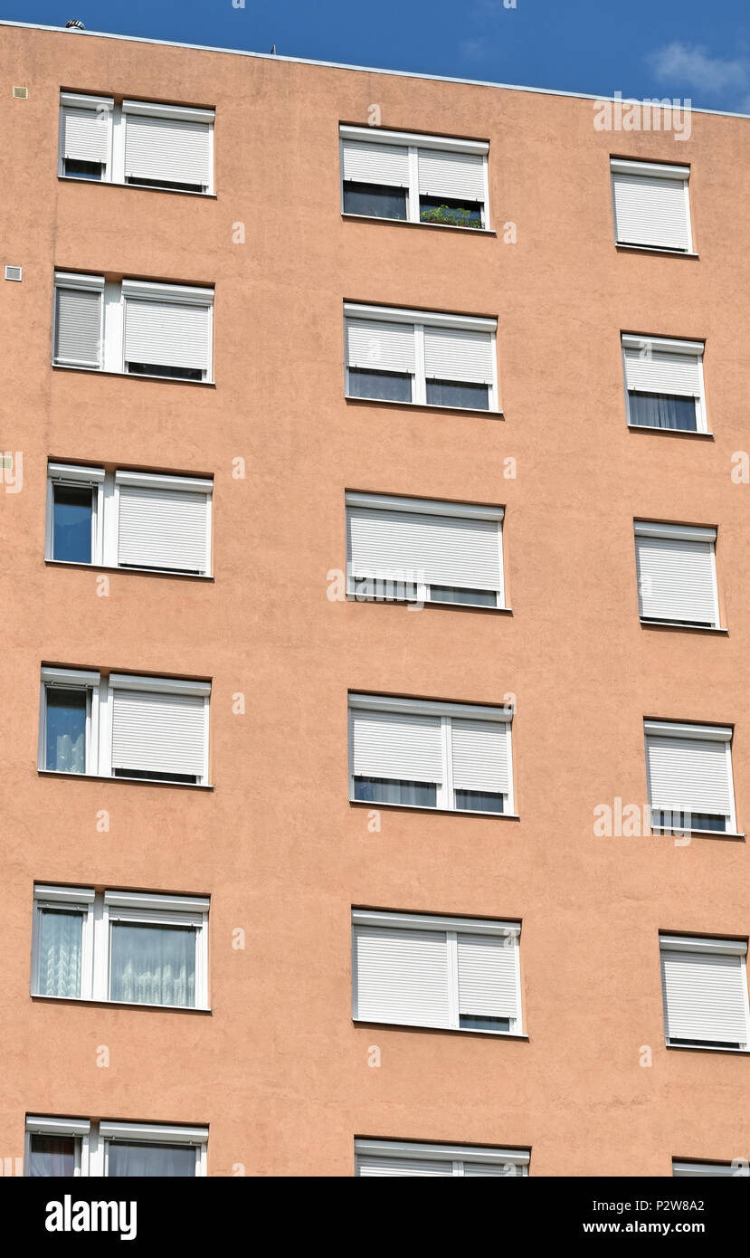 Windows of an apartment building Stock Photo - Alamy