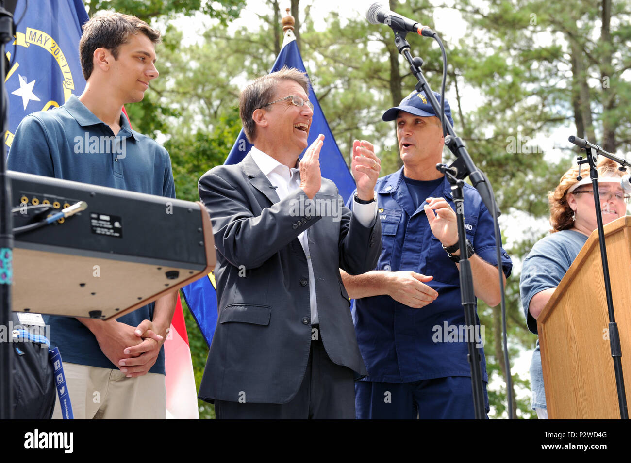 North Carolina Gov. Pat McCrory applauds while on stage with Coast ...