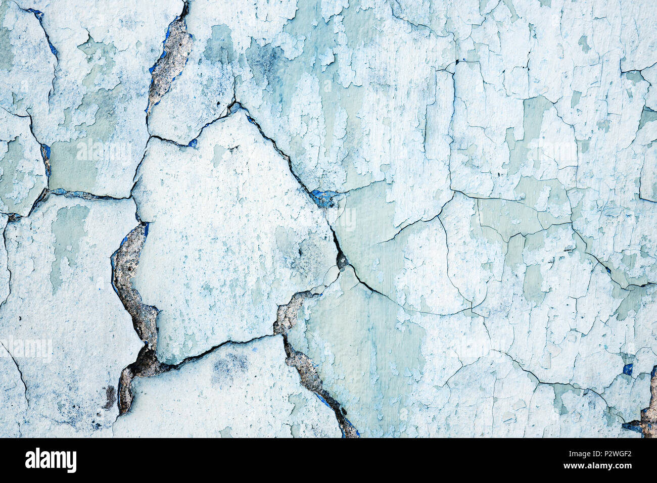 Grunge blue white wall with peeling paint, close-up background photo ...