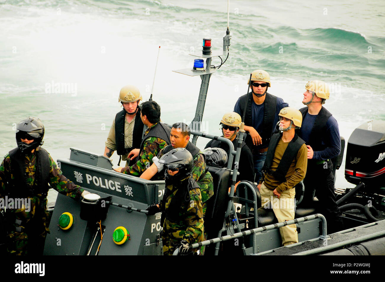 Hong Kong Maritime Small Boat Division police officers and United ...