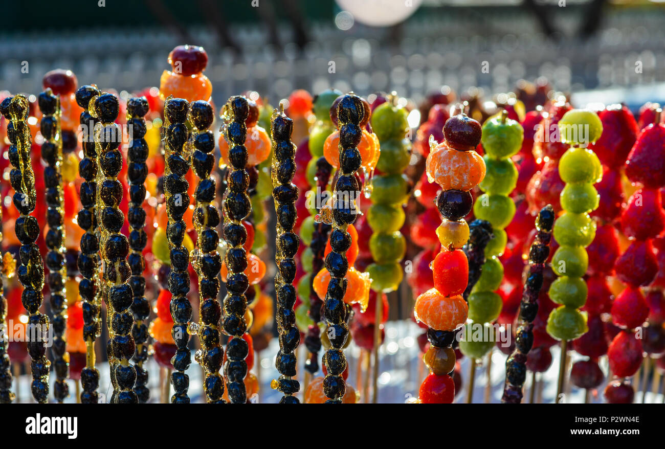 Frozen sugar coated fruits with icy background in winter Stock Photo ...
