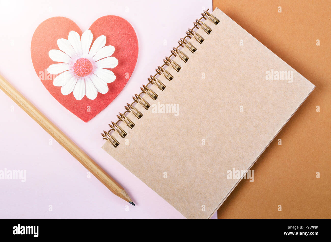 Blank diary and red heart with wooden pen on beautiful background for ...
