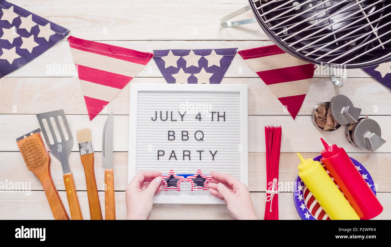 July 4th BBQ Party sign on memo board with July 4th decorations Stock ...