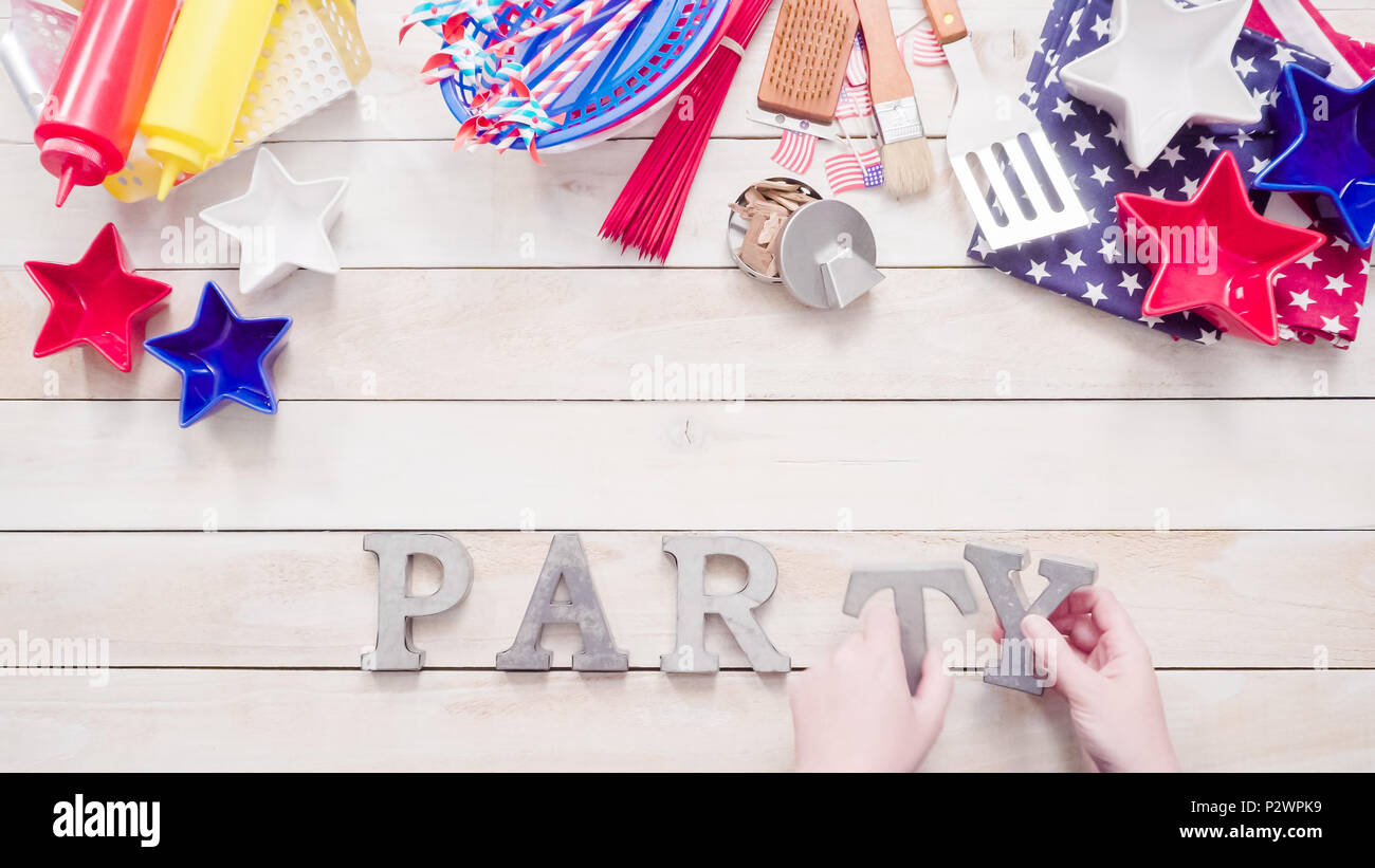 Metal Party sign with July 4th decorations on a wood boards Stock Photo ...