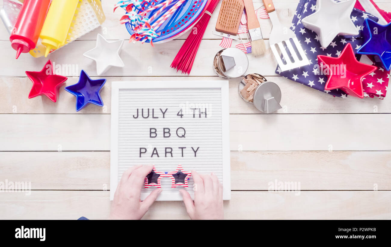July 4th BBQ Party sign on memo board with July 4th decorations Stock ...