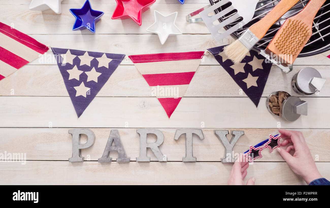 Metal Party sign with July 4th decorations on a wood boards Stock Photo ...