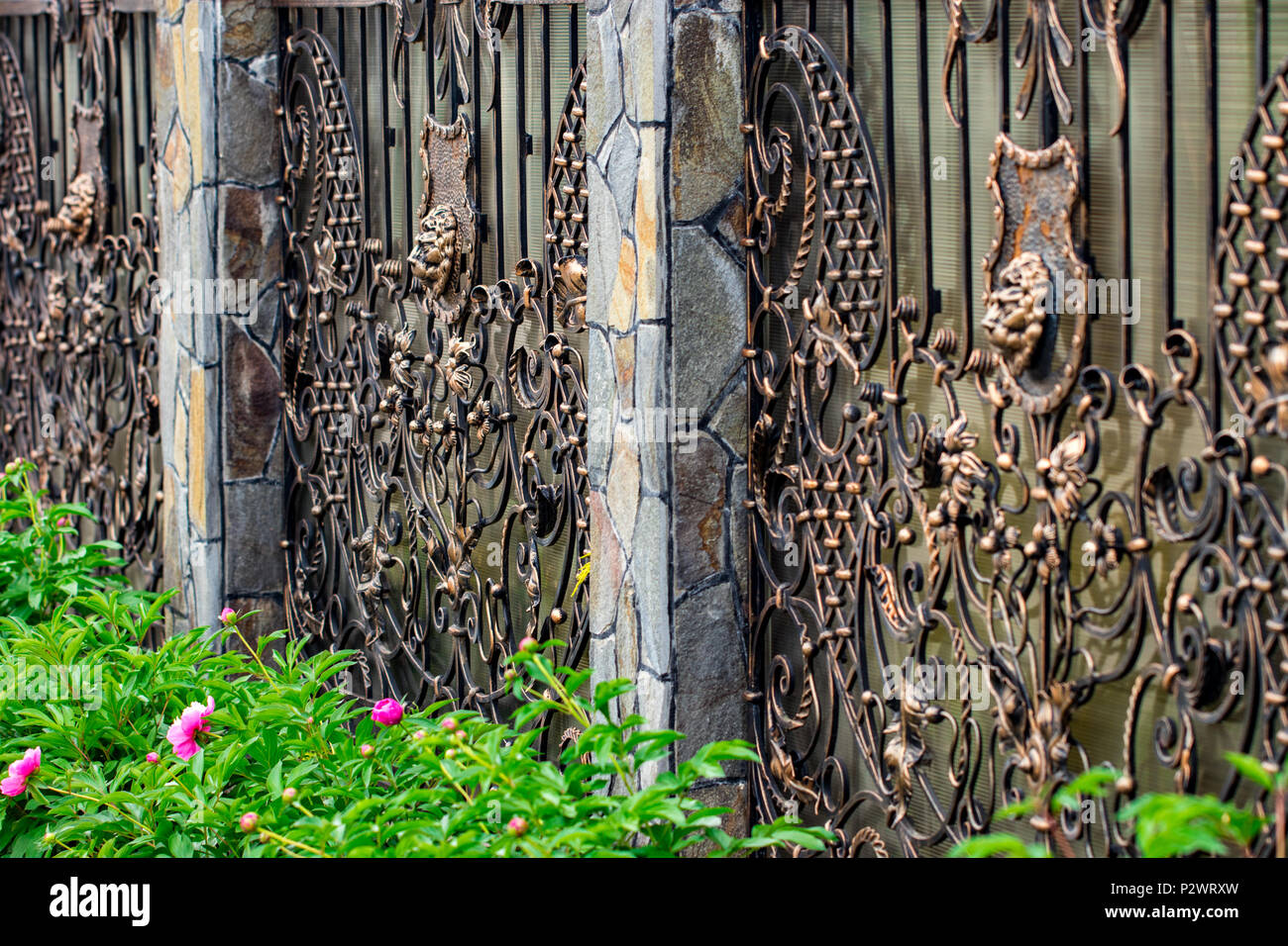 Details, structure and ornaments of forged iron gate. Decorative ...