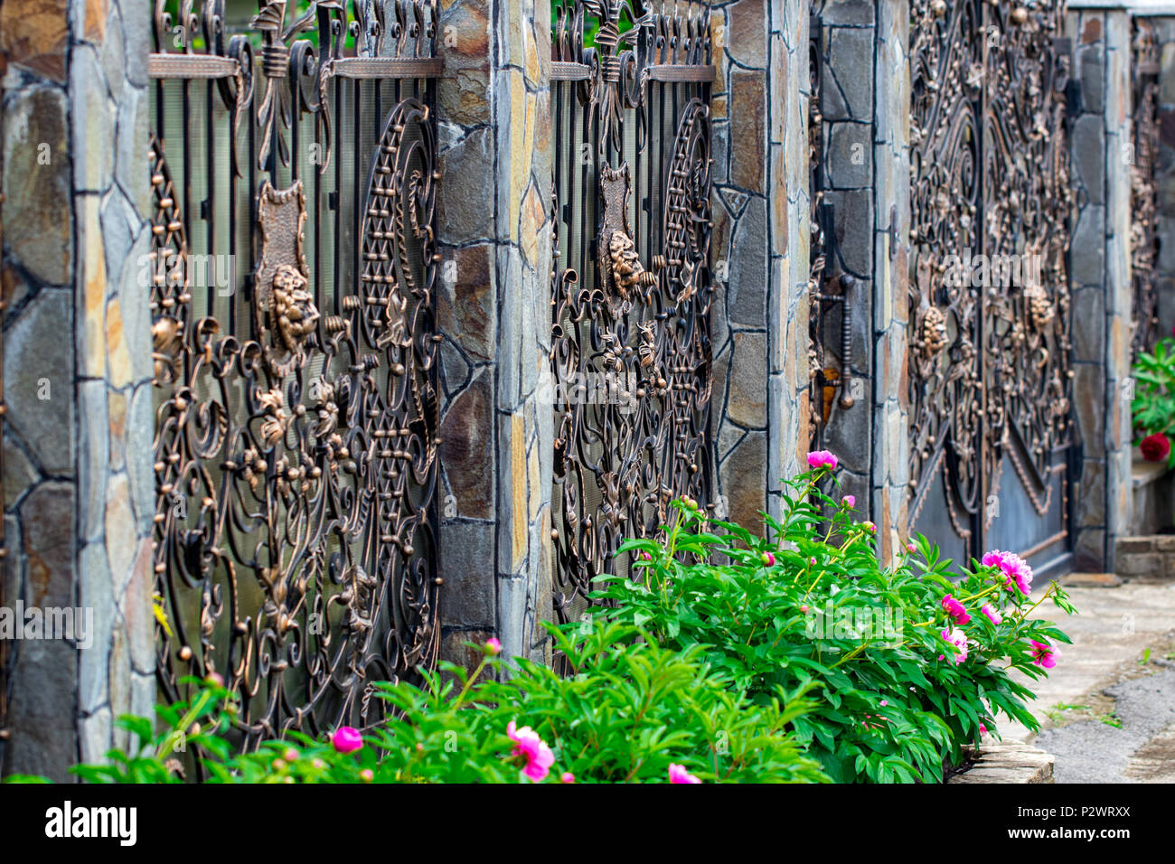 Details, structure and ornaments of forged iron gate. Decorative ...