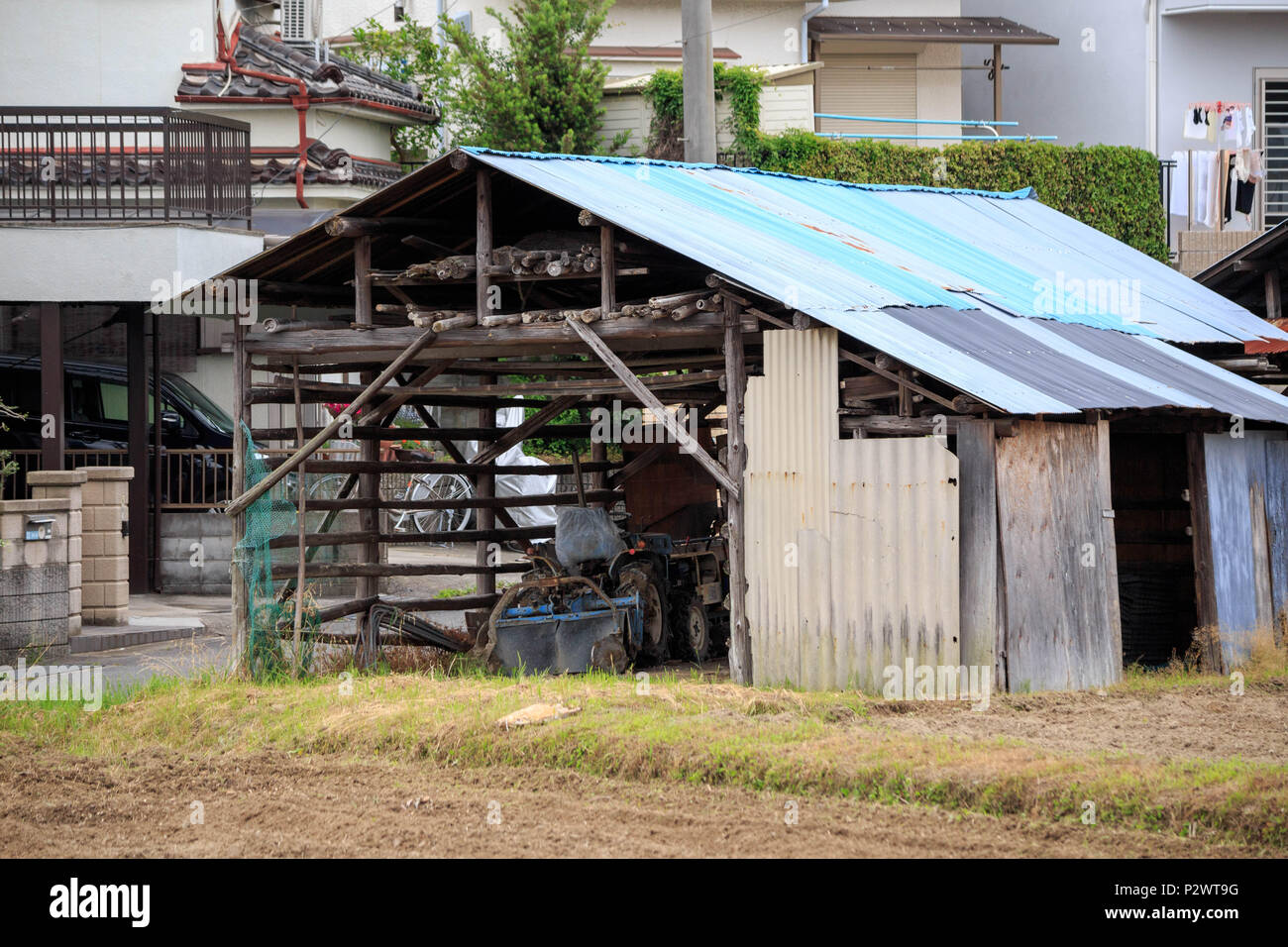 Storage shack on small Japanese urban farm Stock Photo - Alamy