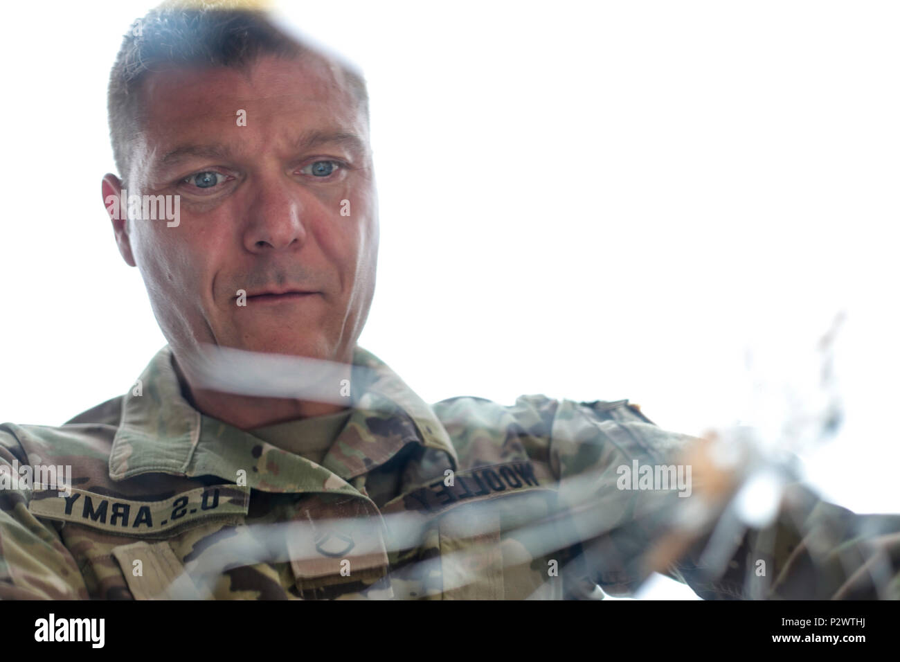 U.S. Army Staff Sgt. Wayne Woolley, a Soldier assigned to the New ...