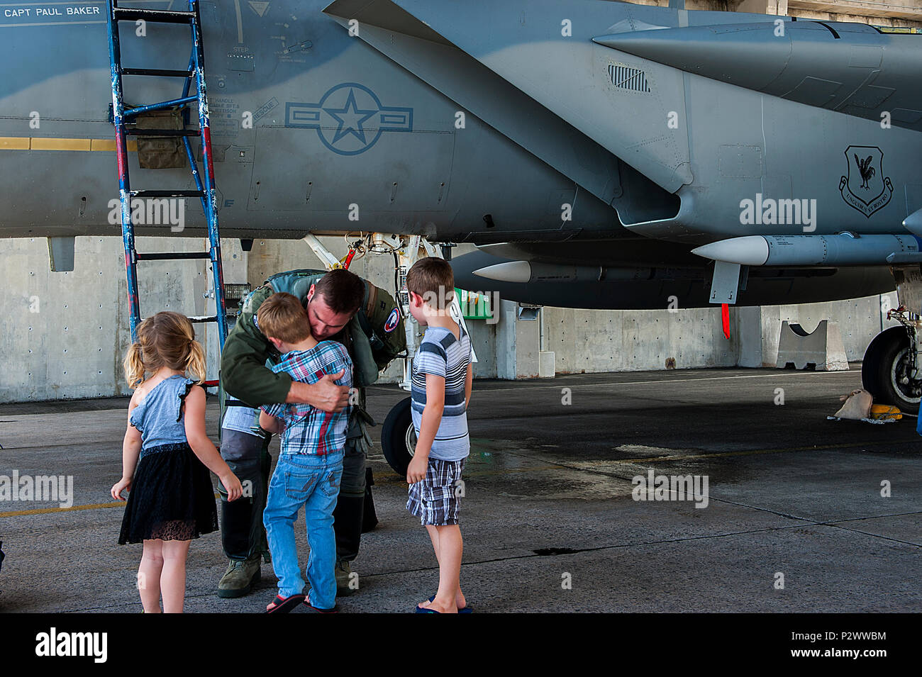 Capt. Tyson Hyer, 44th Fighter Squadron pilot, is greeted by his ...