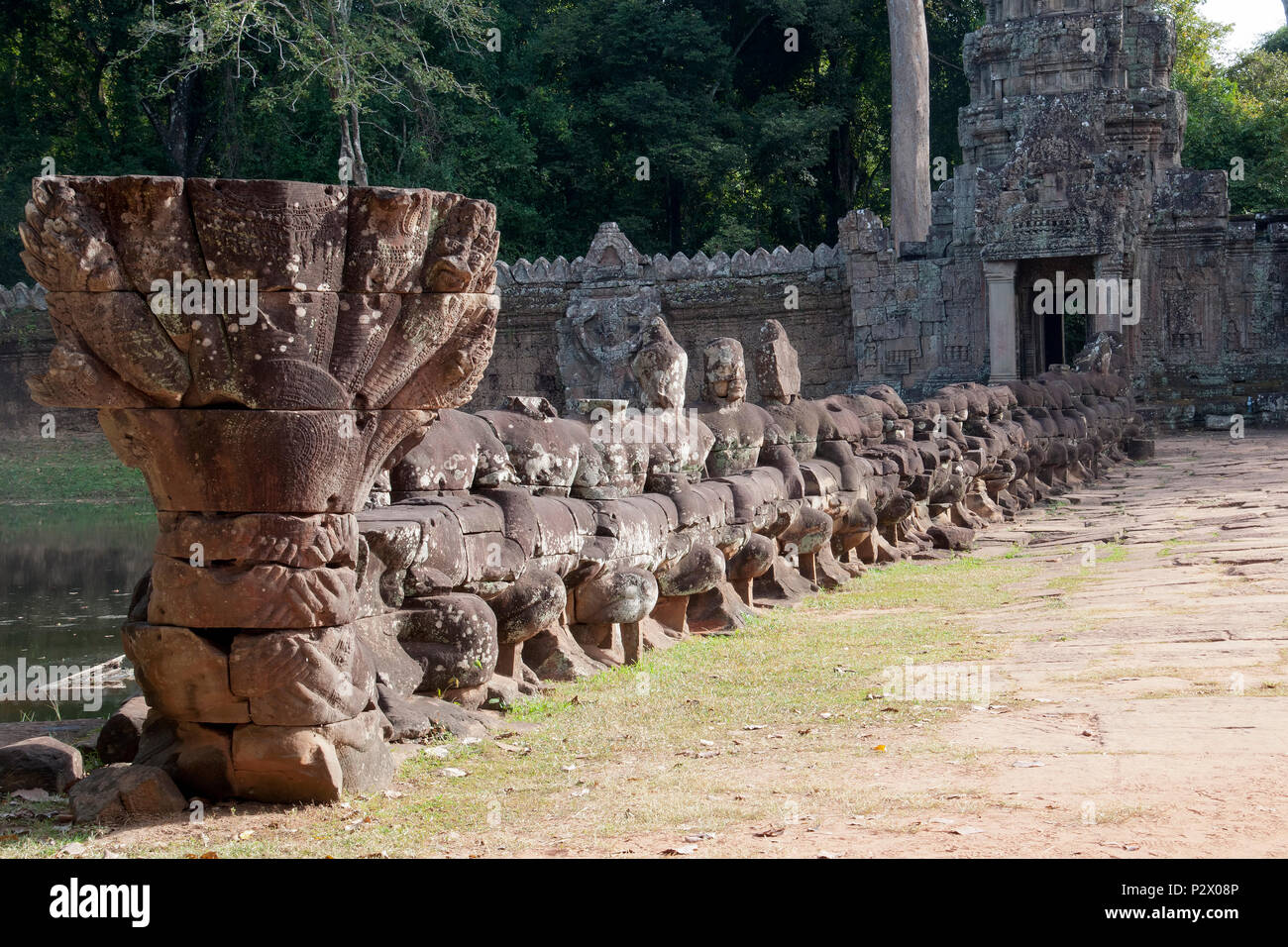Angkor Cambodia, Northern Gate causeway headless naga statue at the ...