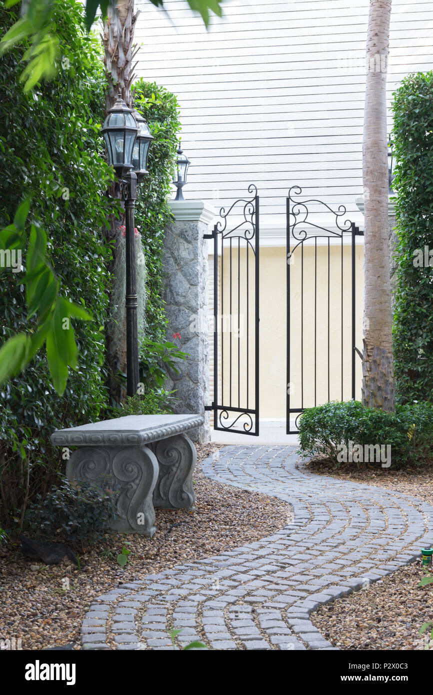 Brick stone walkway in the luxury garden Stock Photo - Alamy