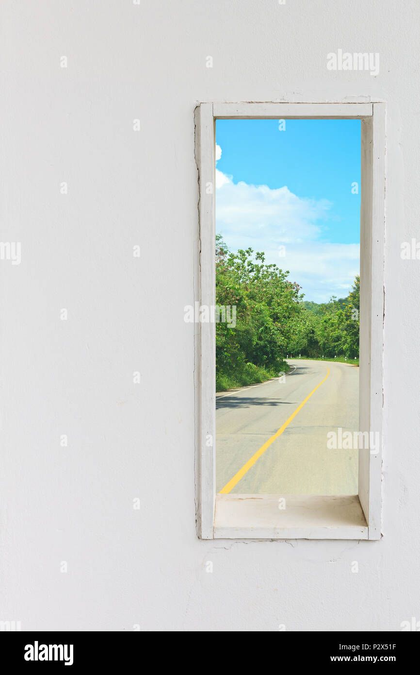 White wall window with street in nature view, vertical landscape ...