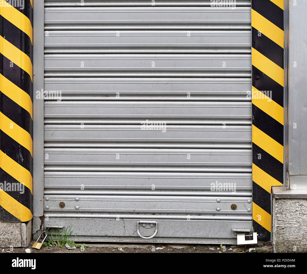 Rolling shutters at closed shop door Stock Photo - Alamy