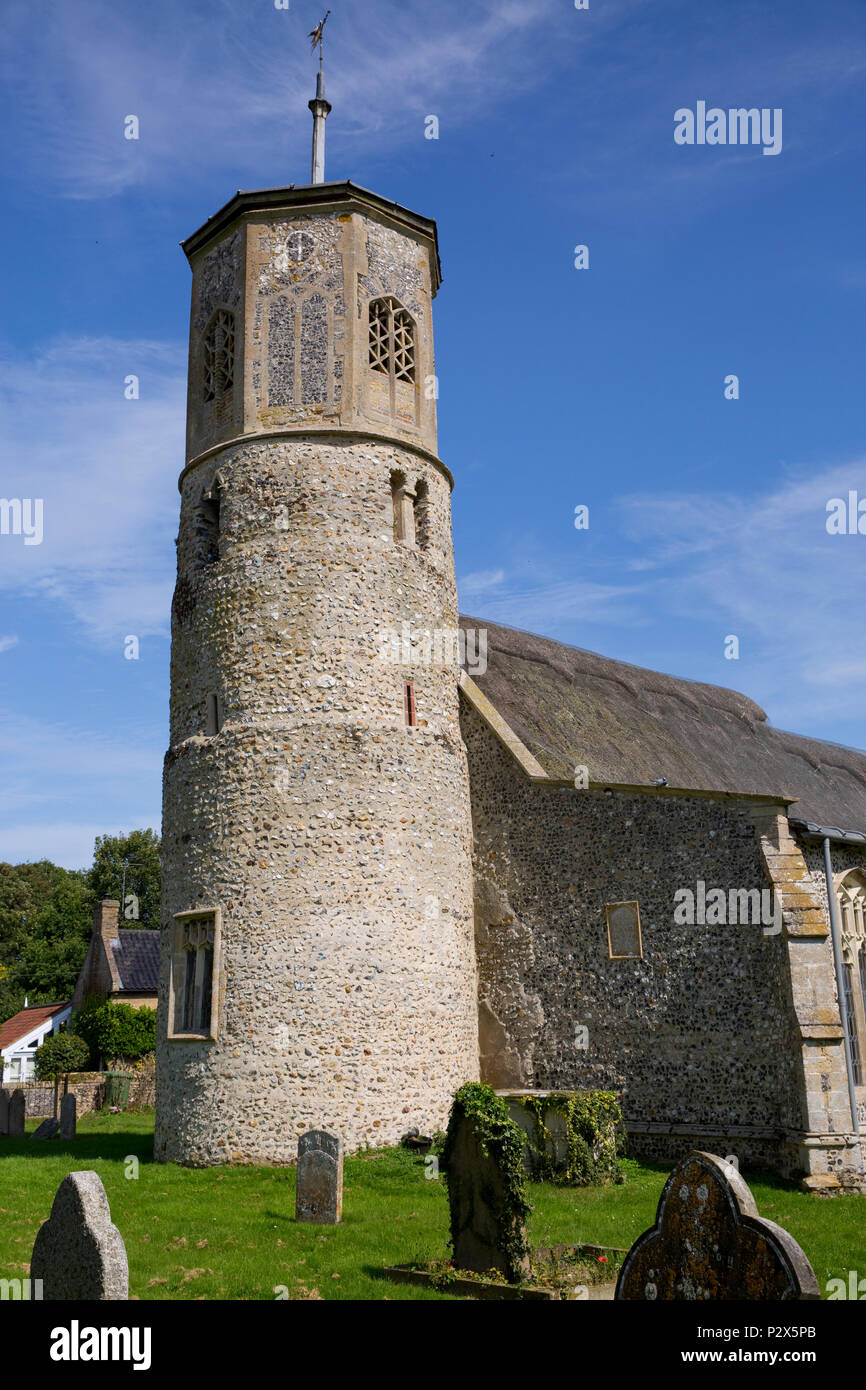 St Mary the Virgin Church, with its octagonal tower and thatched roof ...